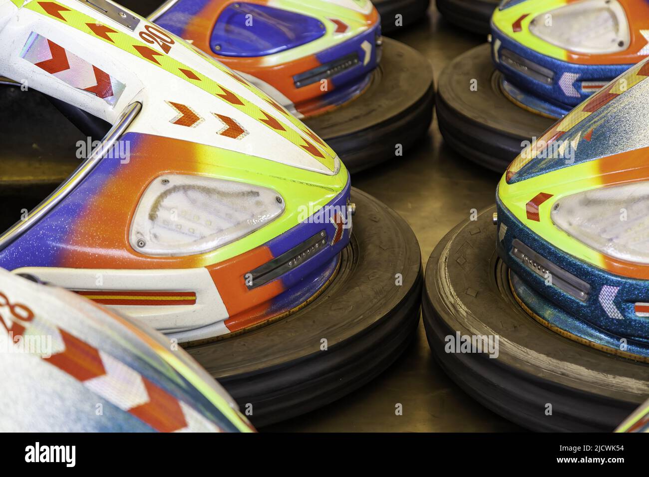 Detail of seats of a fair, fun and party attraction Stock Photo - Alamy