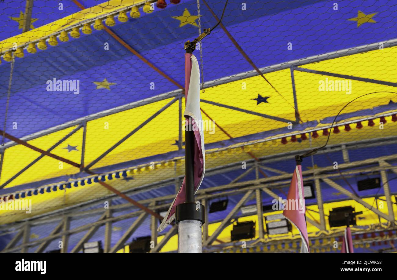 Detail of seats of a fair, fun and party attraction Stock Photo - Alamy
