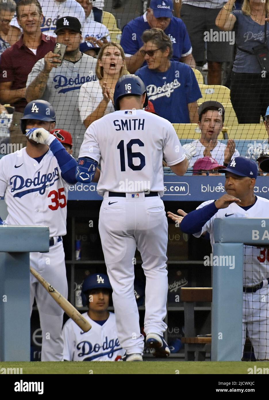 Los Angeles Dodgers Will Smith (16) returns to the dugout after hitting ...