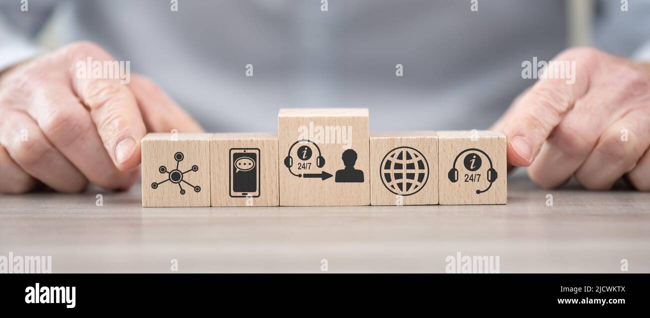 Wooden blocks with symbol of customer service concept Stock Photo - Alamy