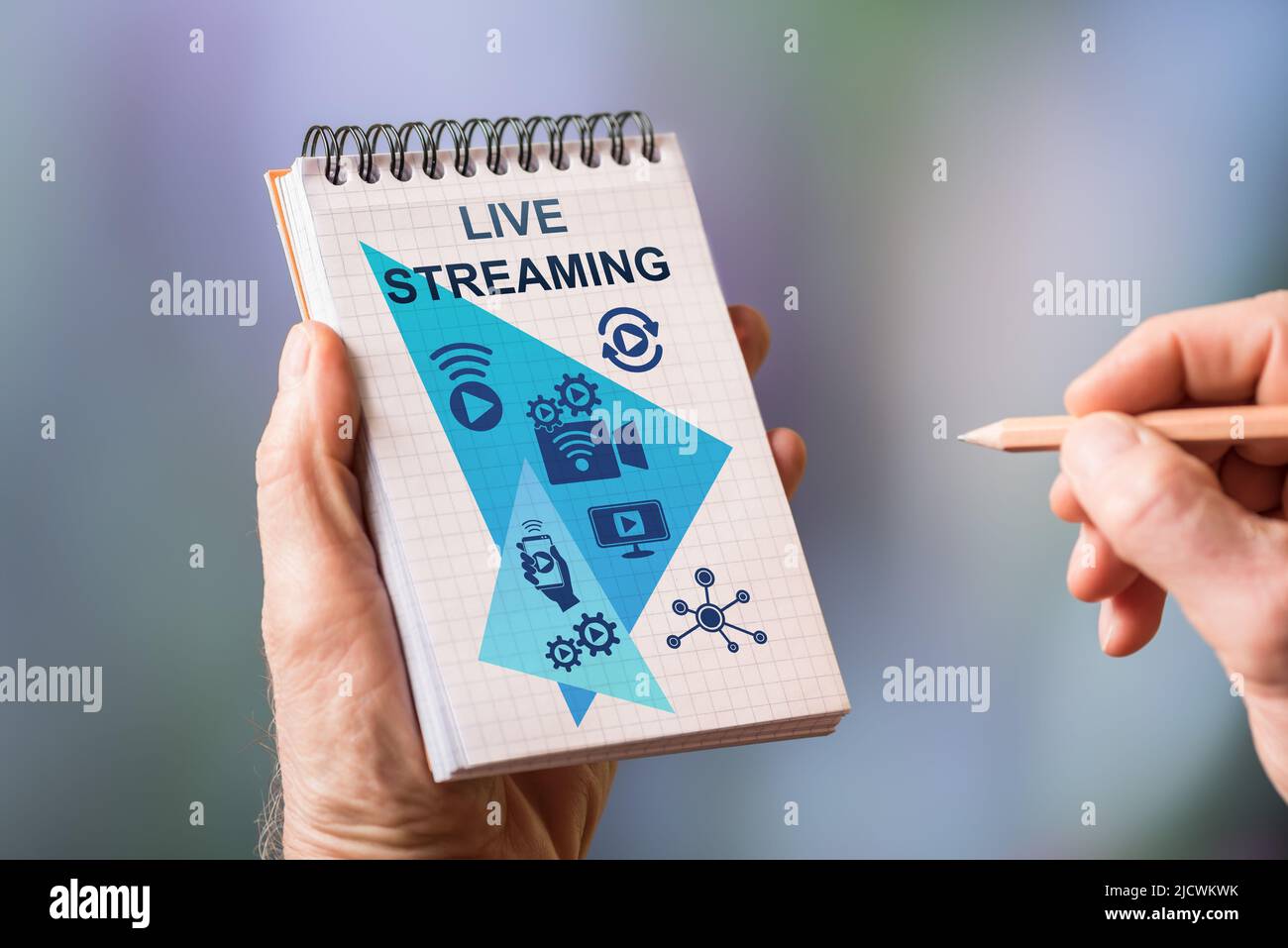 Hand drawing live streaming concept on a notepad Stock Photo - Alamy