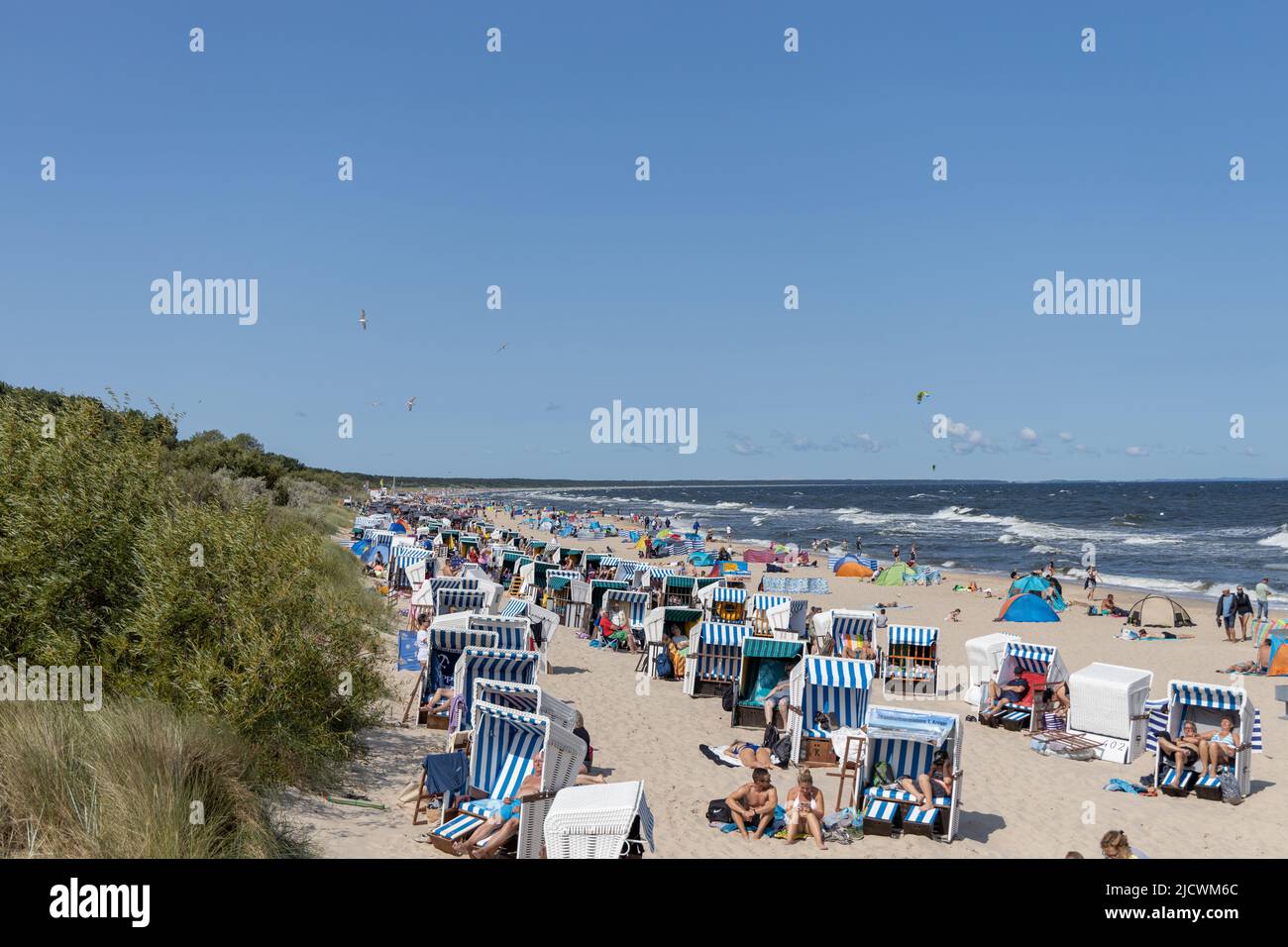 The view of the beach of Zempin on the island of Usedom with many beach ...