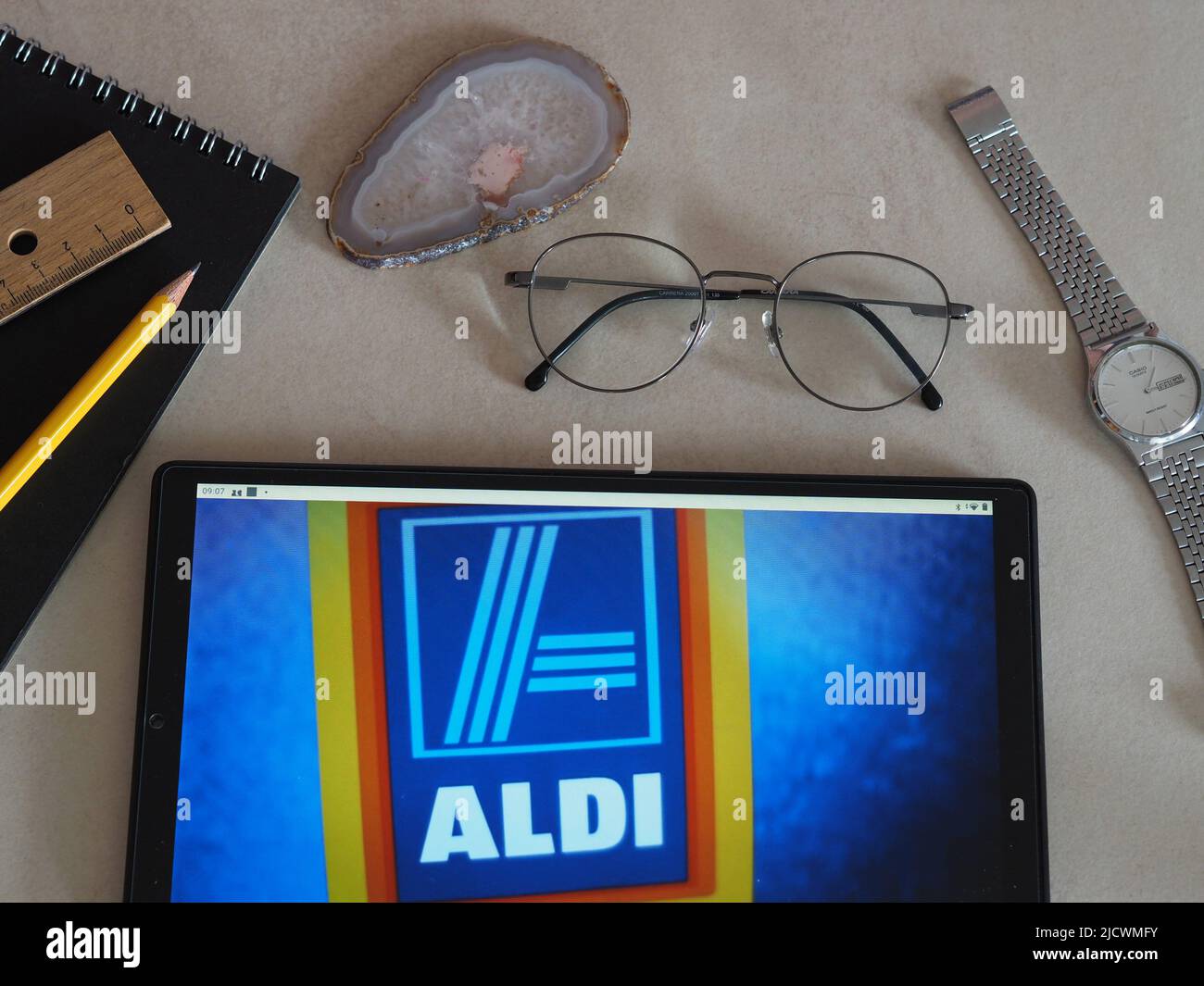 In this photo illustration Aldi logo seen displayed on a tablet Stock ...