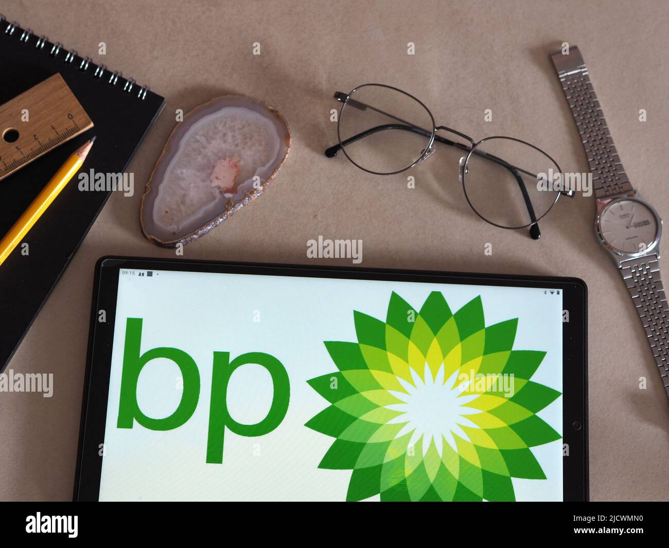 In this photo illustration BP plc logo seen displayed on a tablet Stock ...