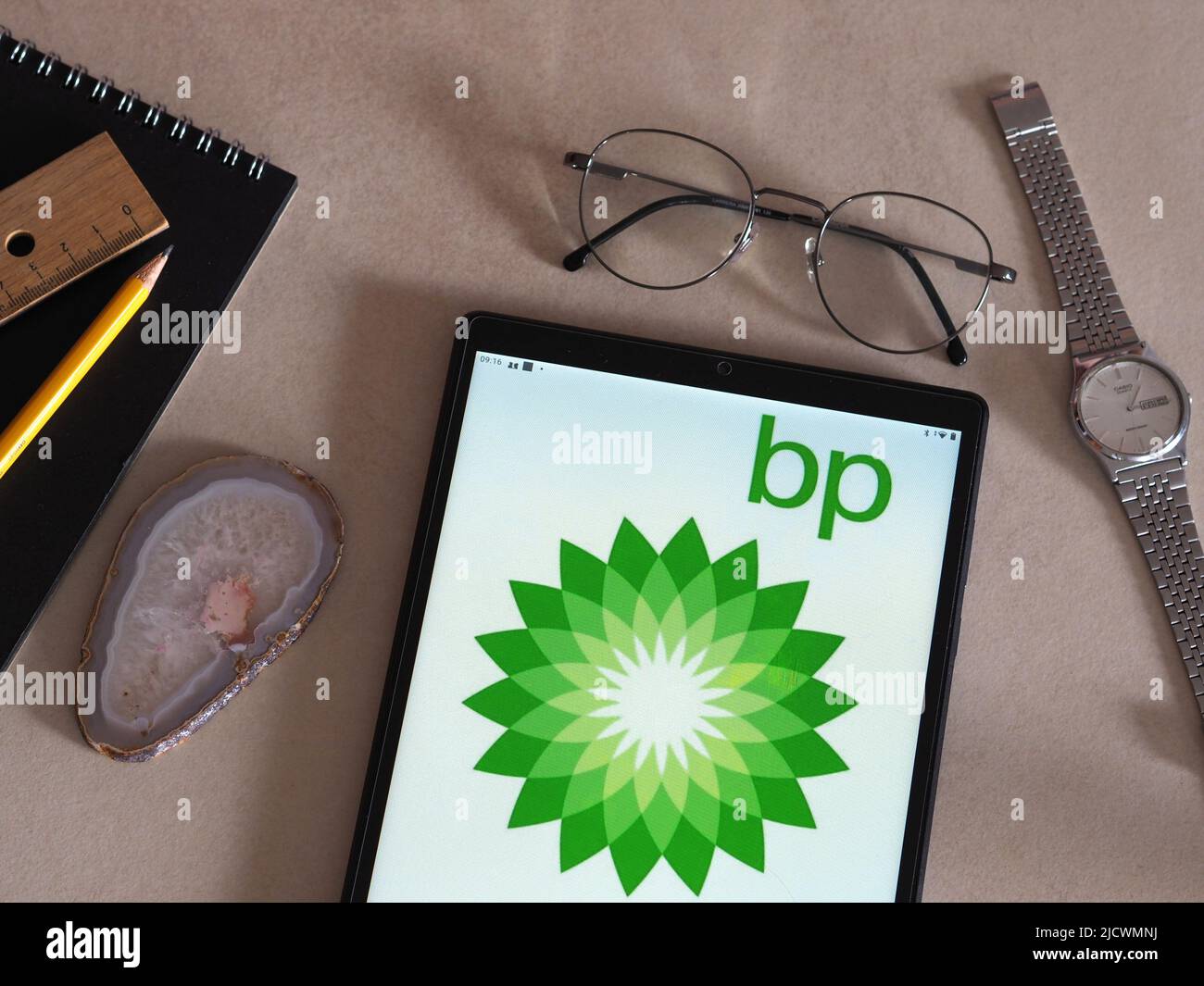 In this photo illustration BP plc logo seen displayed on a tablet Stock ...