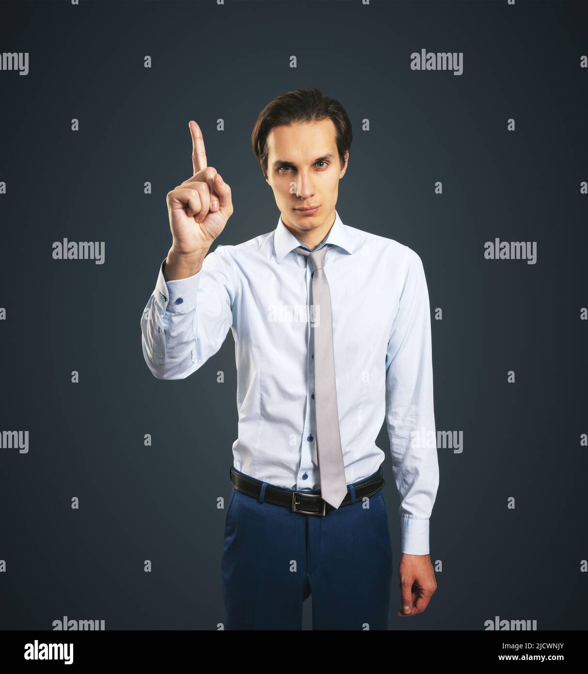 Warning and notification concept with young man with rising up index ...