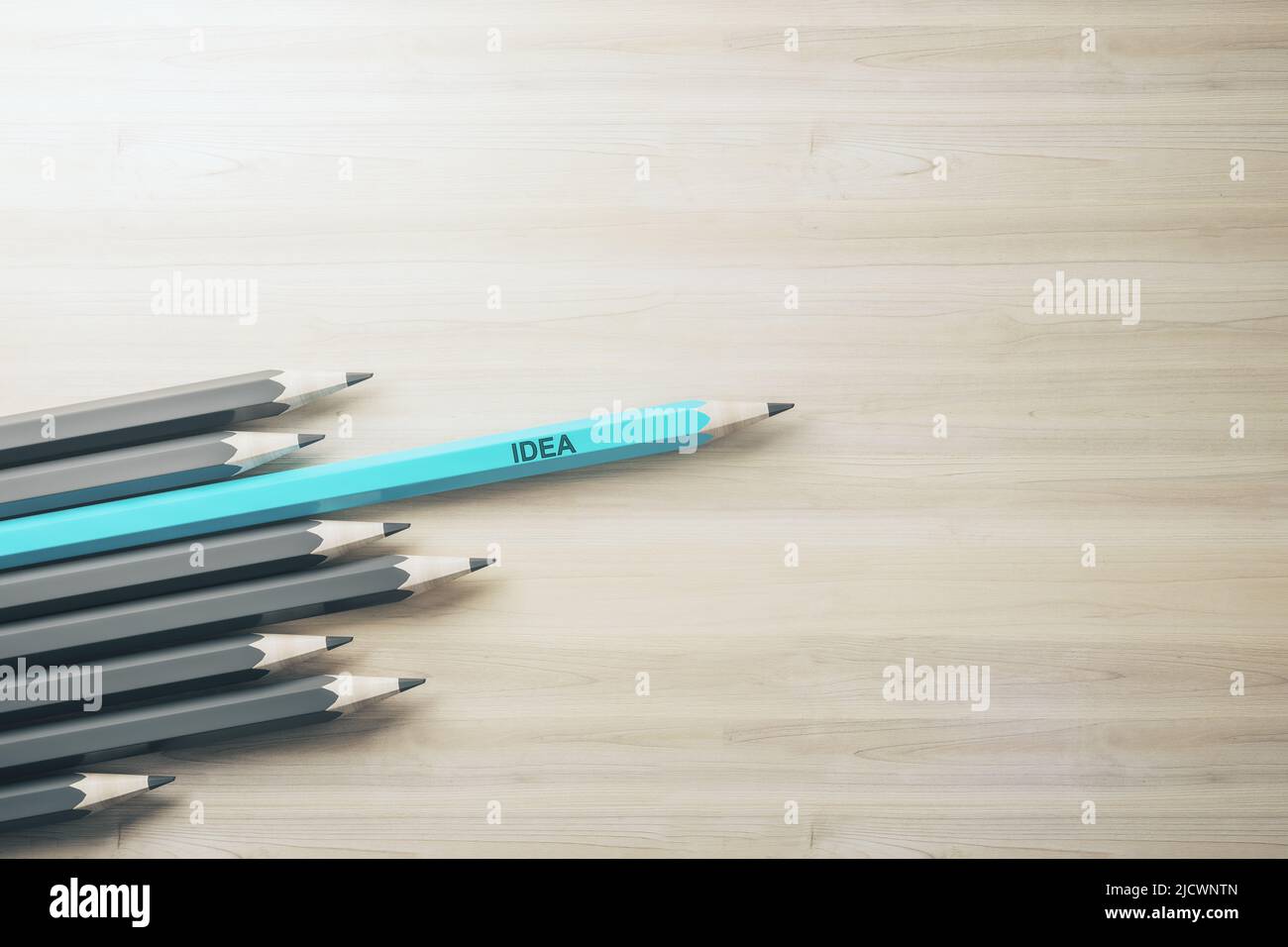 Creativity inspiration and idea concept with row of grey pencils and ...