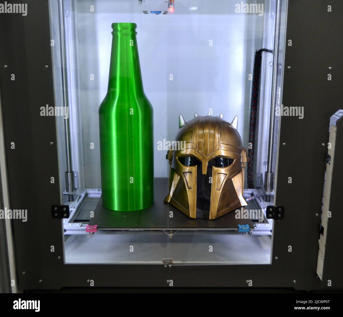 Object printed on 3D printer, on desktop of 3d printer. Progressive ...