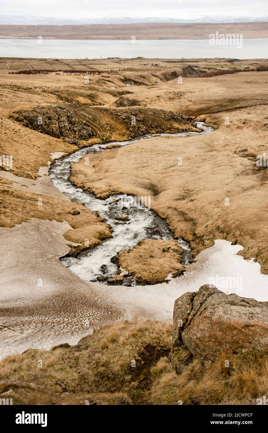 Mountain stream flowing into sea hi-res stock photography and images ...