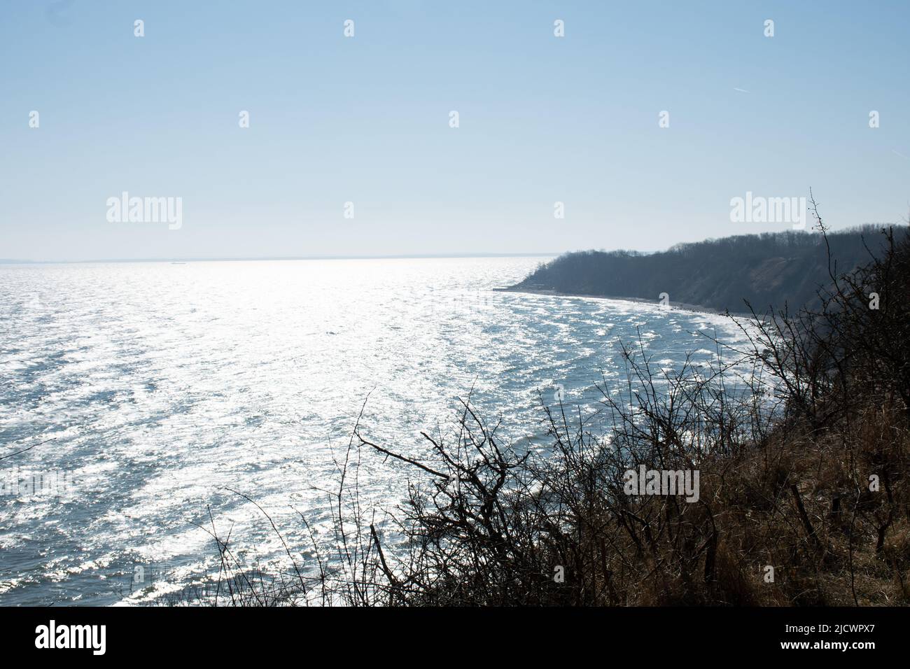 View of a bay in the Baltic Sea glistening in the sunlight Stock Photo ...