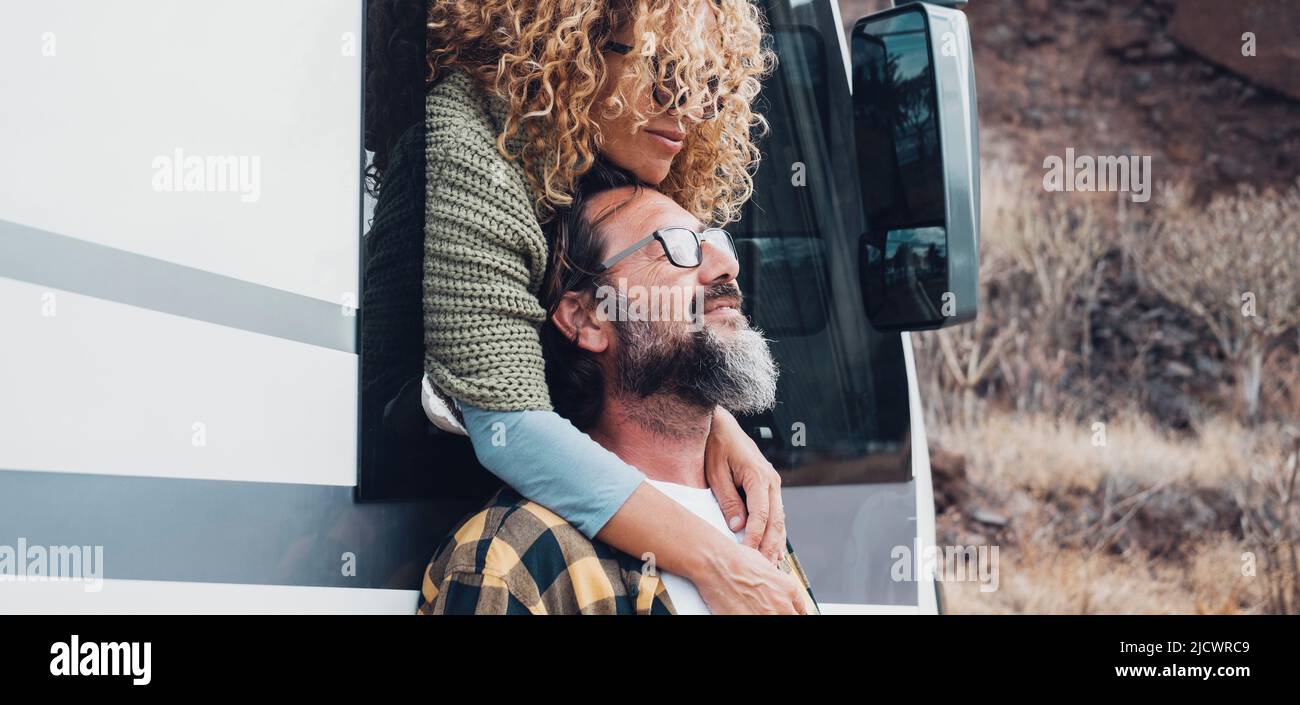 Travel with vehicle concept lifestyle with happy couple in love hugging ...