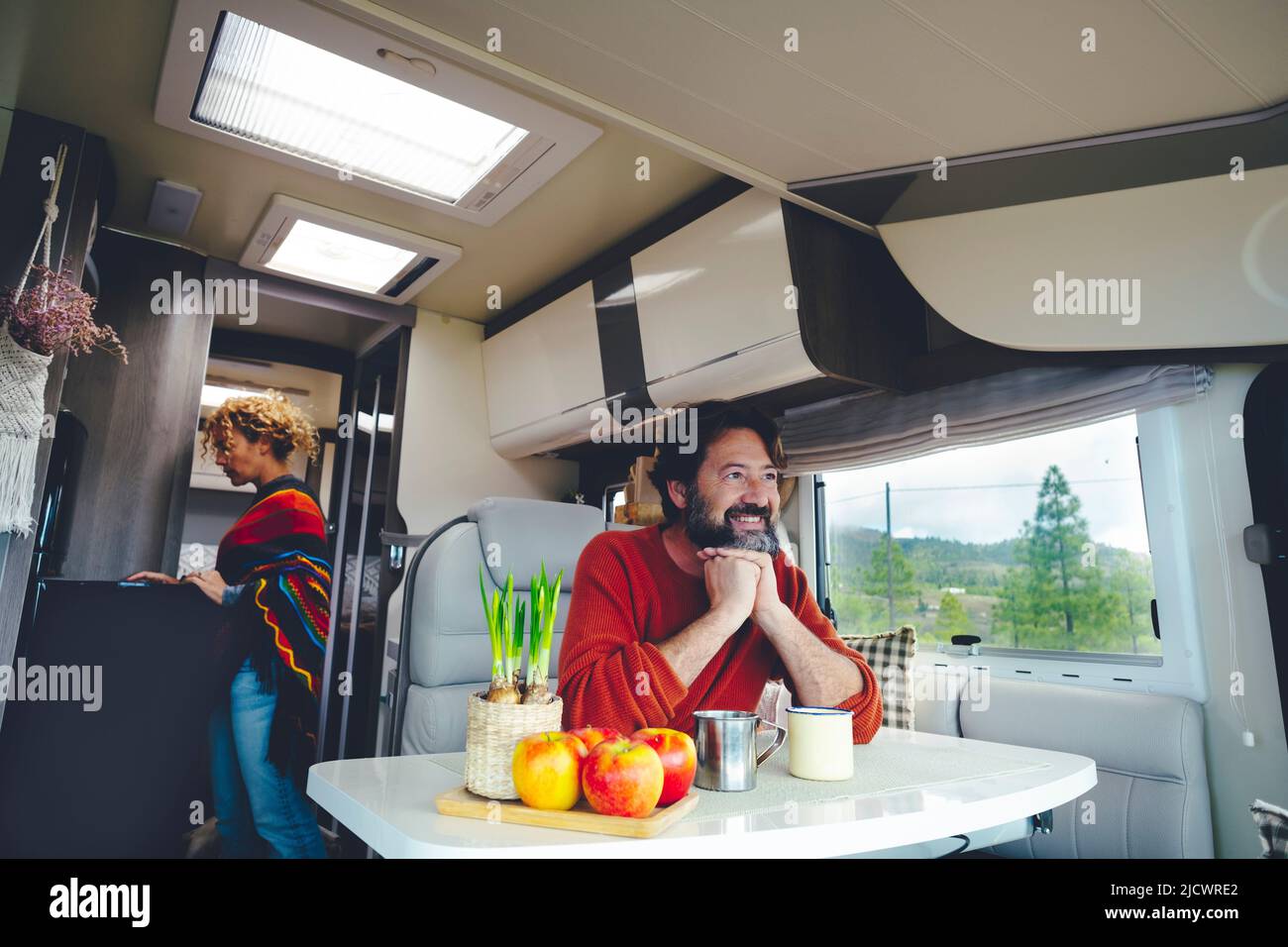 Travel people and off grid lifestyle living van life inside a camper ...