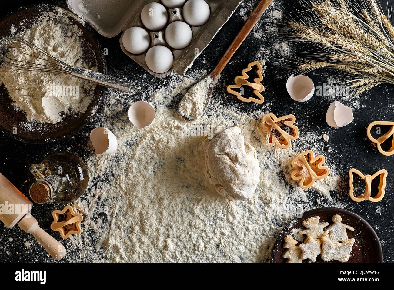 Cooking dough for cookies, butter, eggs, cooking equipment, flour on a ...