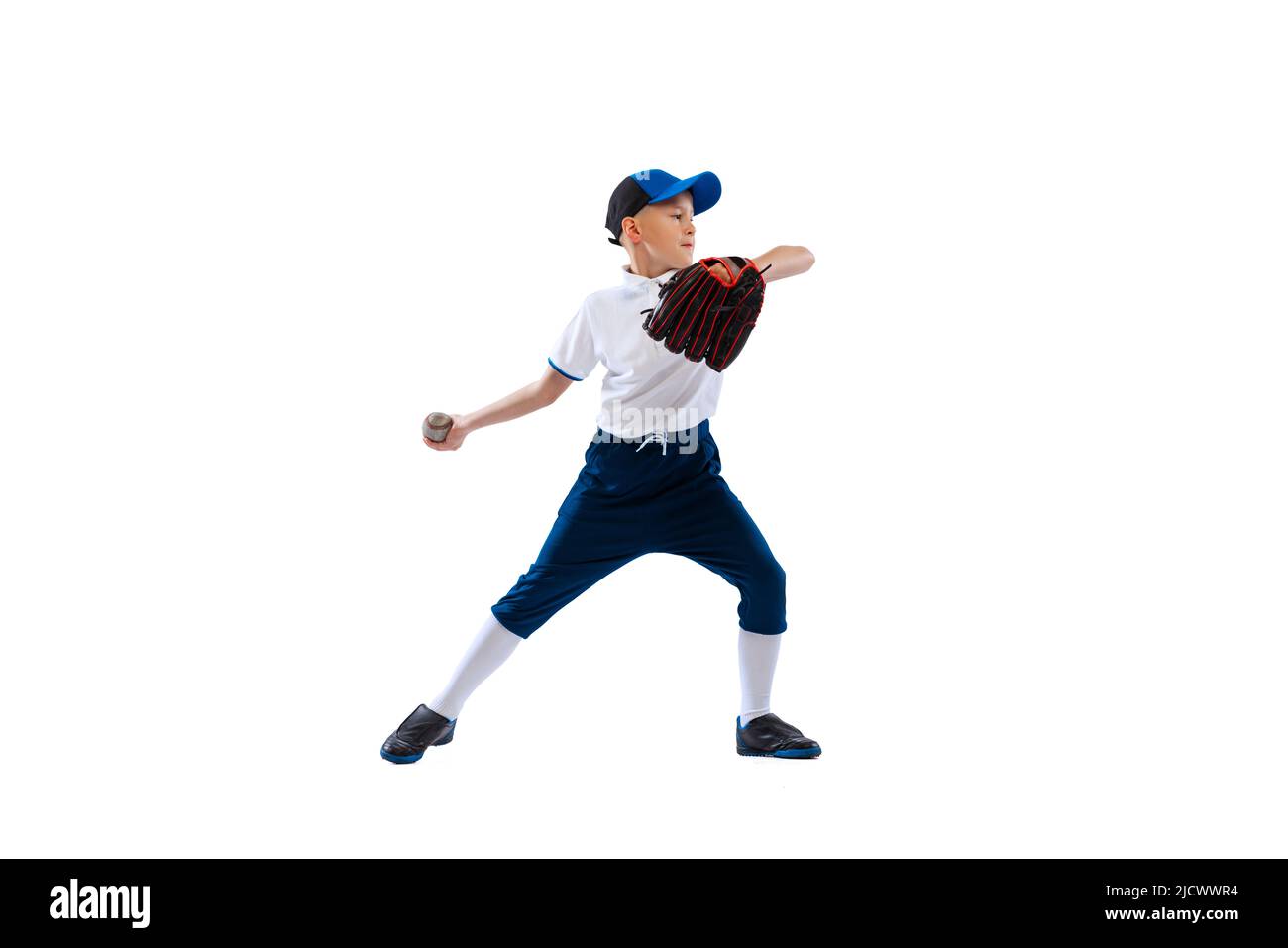 Little boy, baseball player, pitcher in blue-white uniform training ...