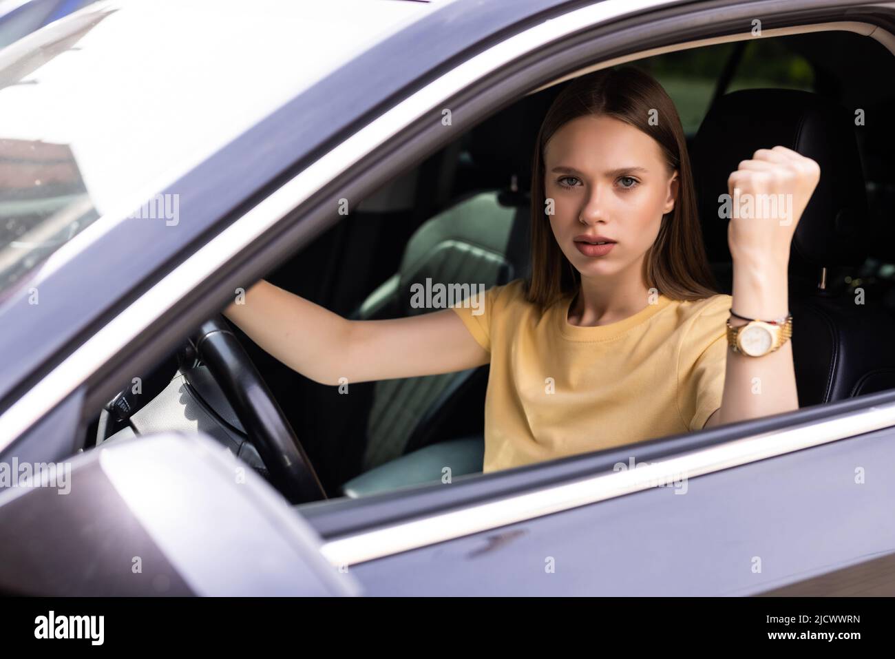 Aggressive woman driving car hi-res stock photography and images - Alamy