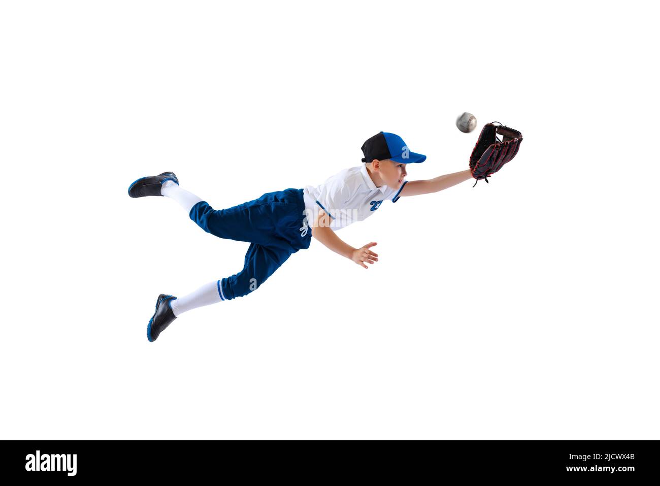 Studio shot of sportive kid, beginner baseball player in sports uniform ...