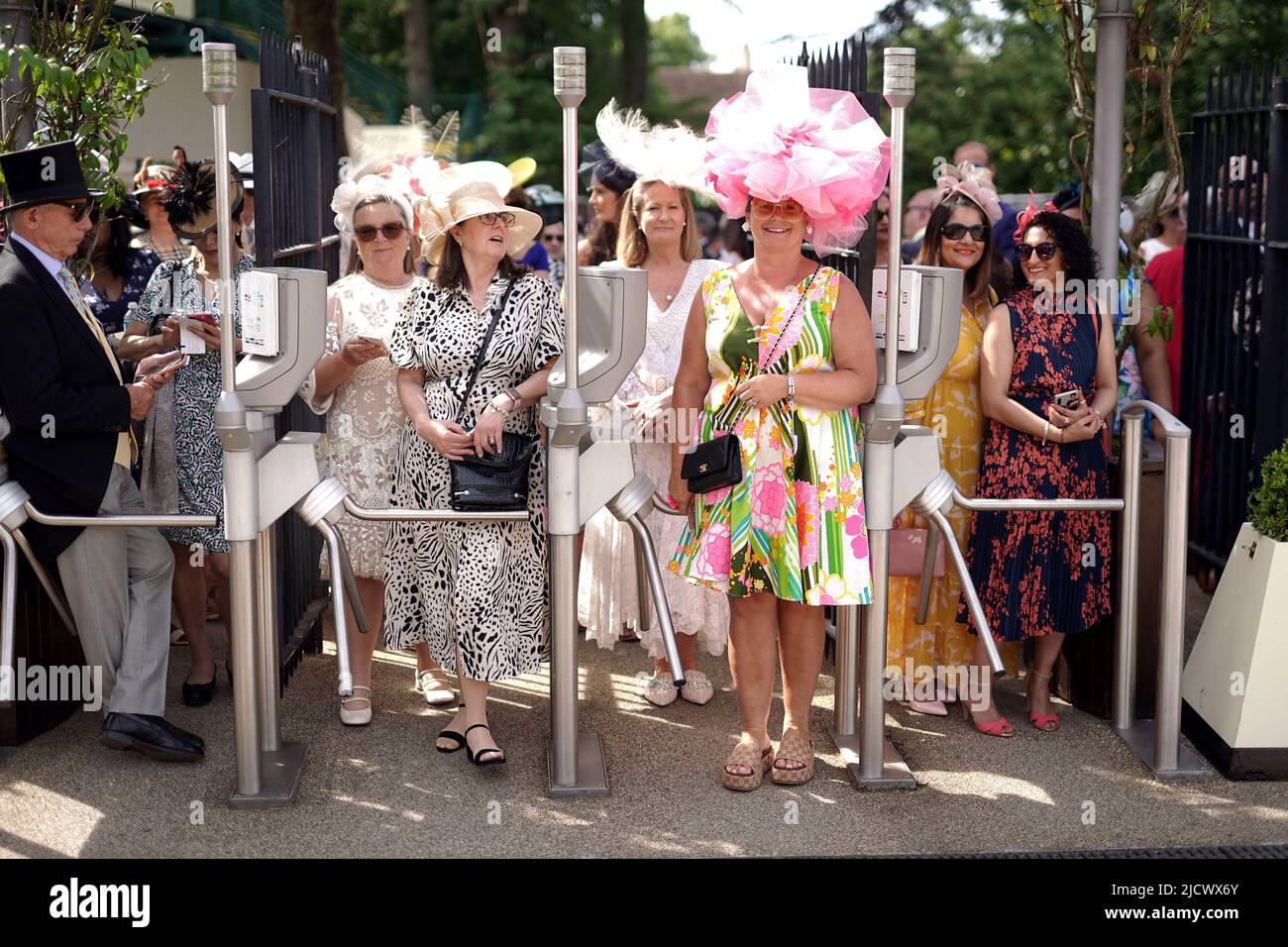 Racegoers arrive on day three of Royal Ascot at Ascot Racecourse ...