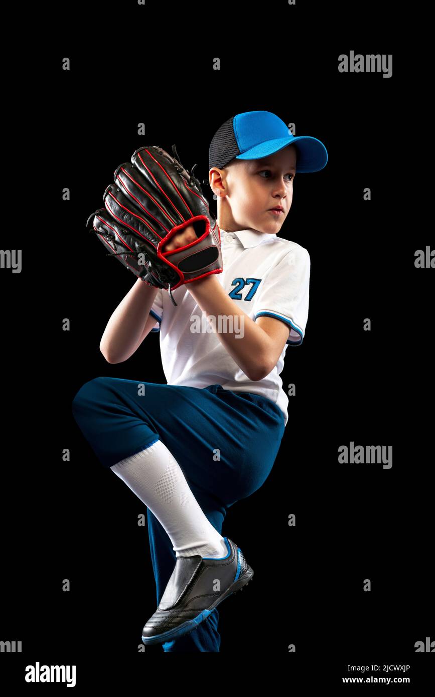 Dynamic portrait of little baseball player, pitcher in blue-white ...