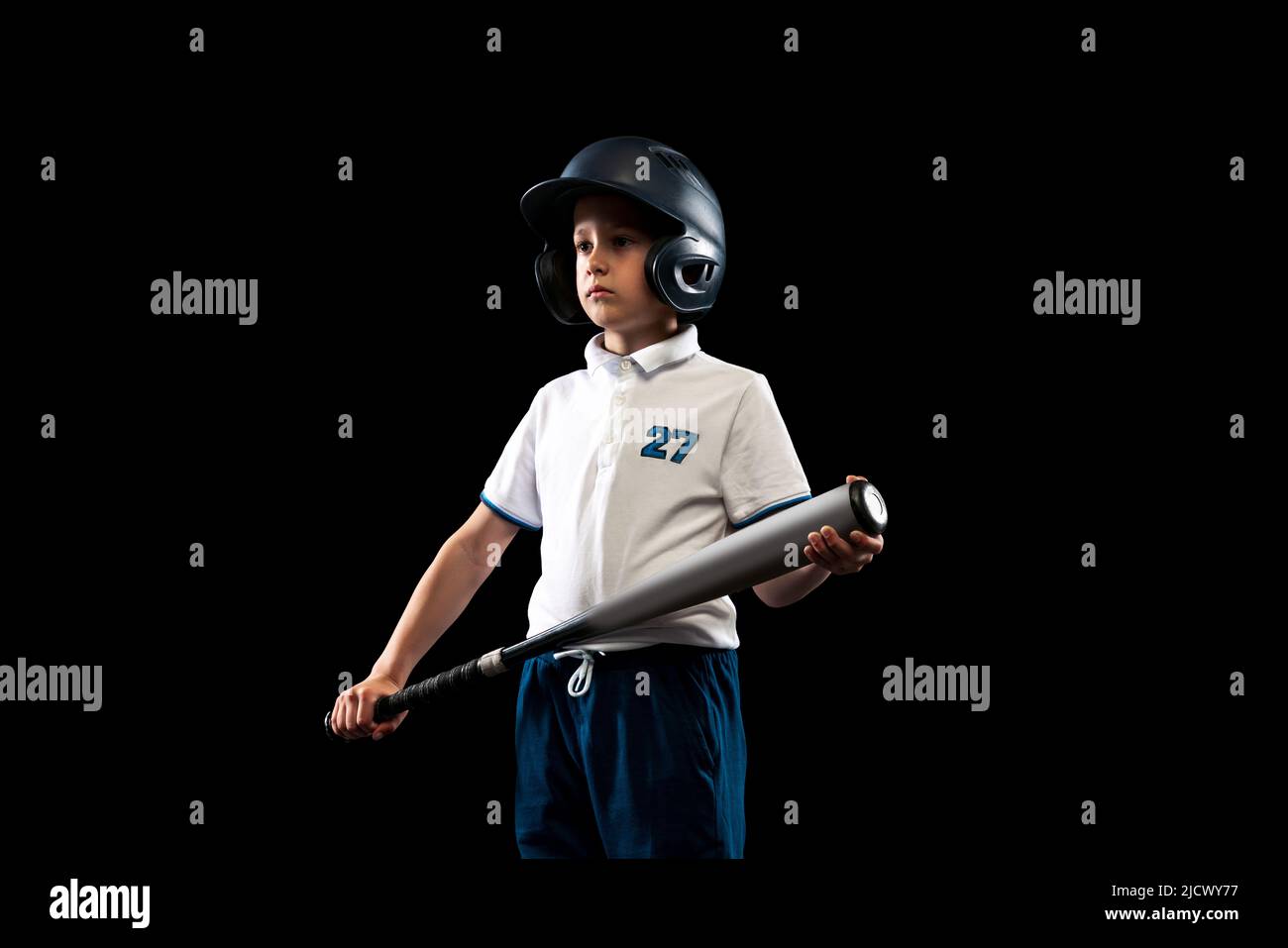 One kid, little baseball player in blue-white uniform leaning to play ...