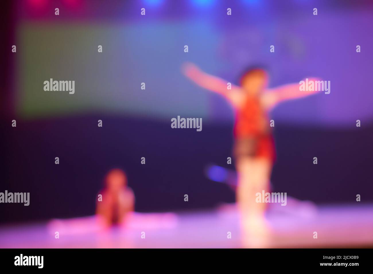 Silhouettes of small dancers with elements of gymnastic dance. Colored ...