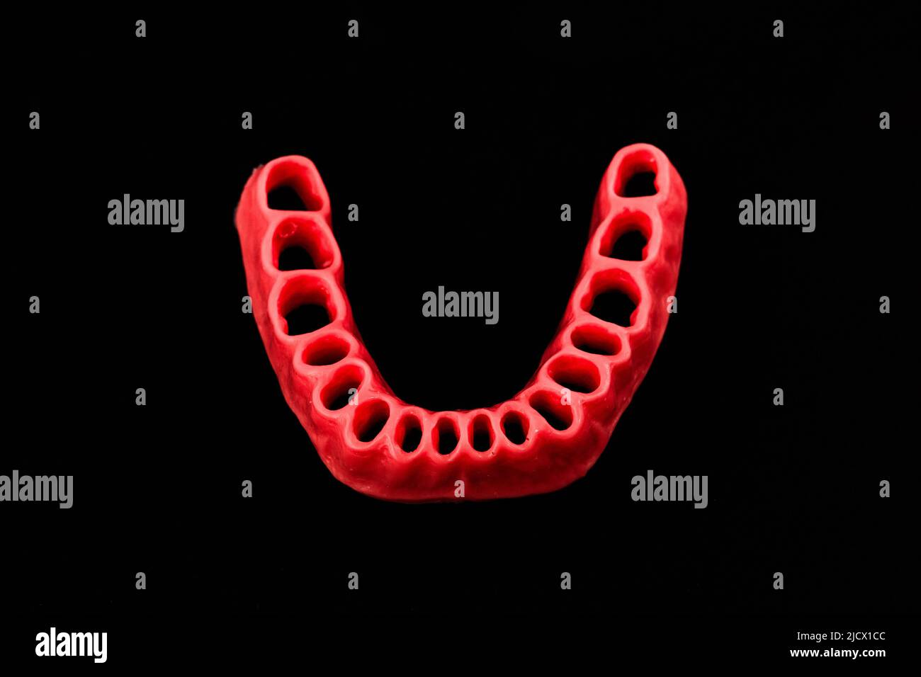 human gums without teeth model medical implant isolated on black ...