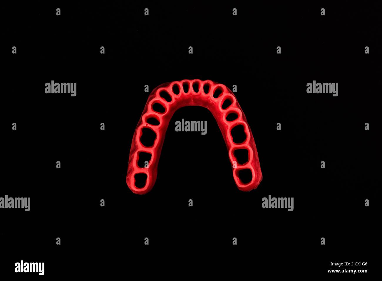 human gums without teeth model medical implant isolated on black ...