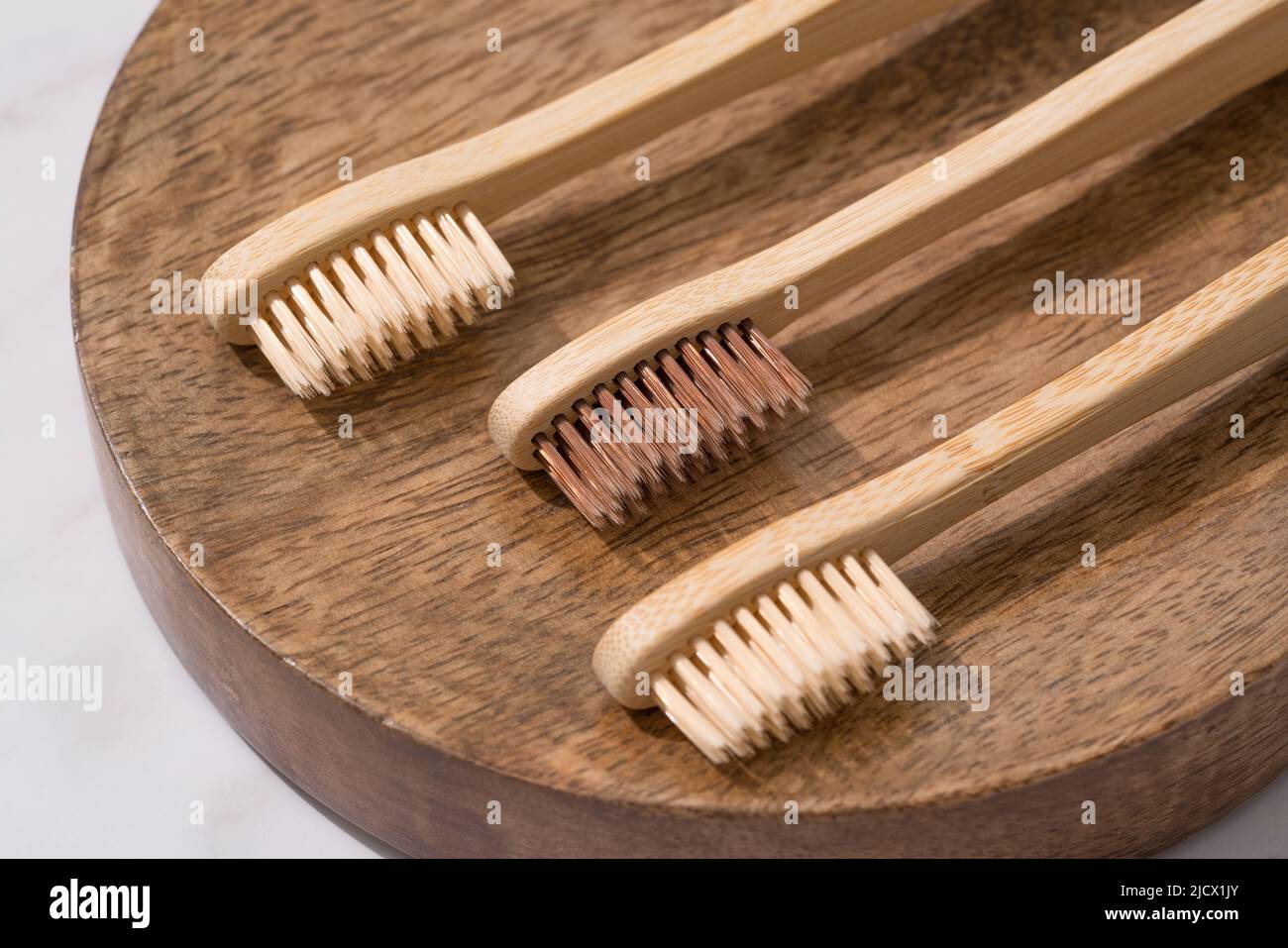 Set of natural wooden toothbrushes wooden tray. Natural bath products ...