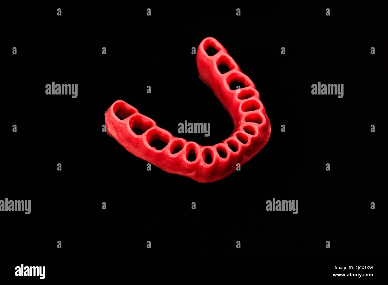 human gums without teeth model medical implant isolated on black ...