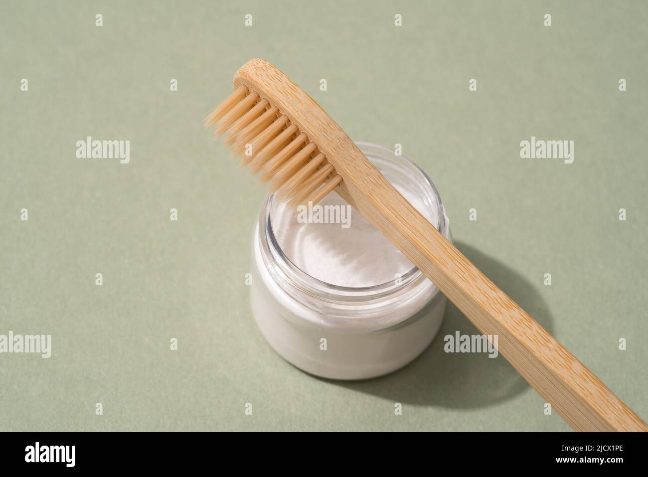 Wooden bamboo toothbrush with mineral toothpowder kaolin in transparent ...