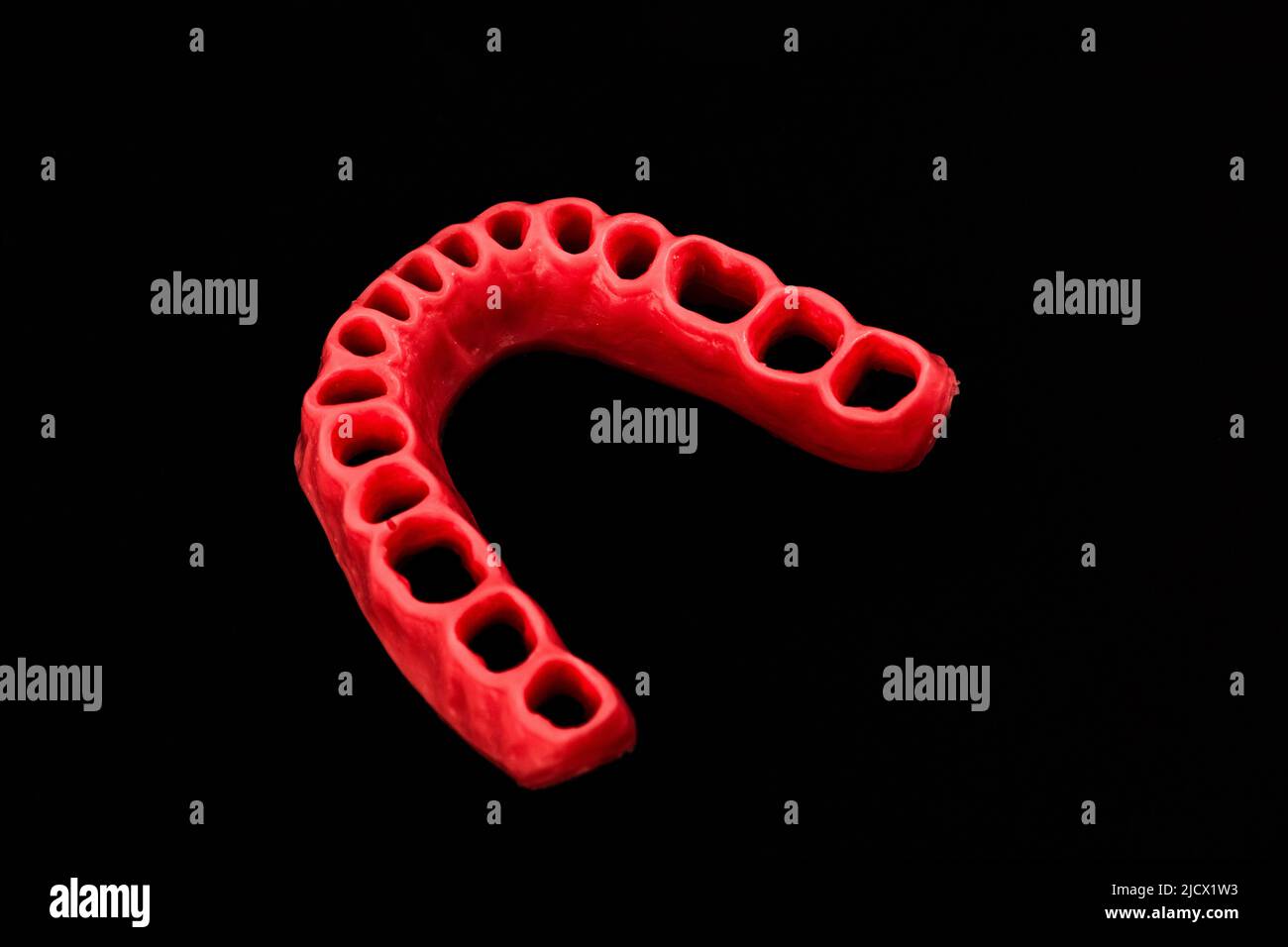 human gums without teeth model medical implant isolated on black ...
