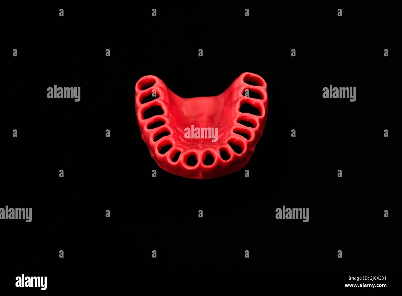 human gums without teeth model medical implant isolated on black ...