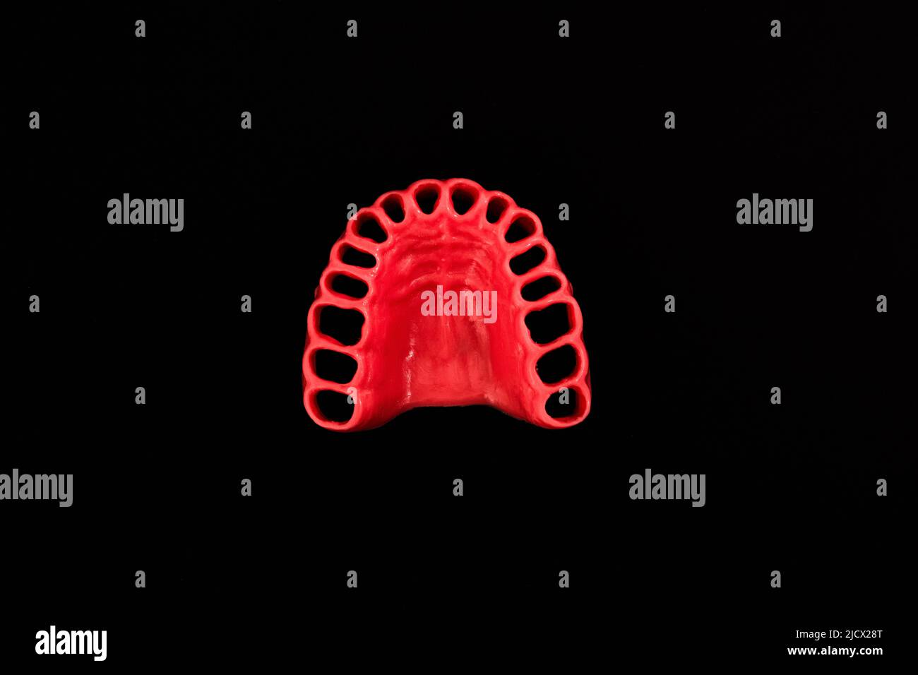 human gums without teeth model medical implant isolated on black ...