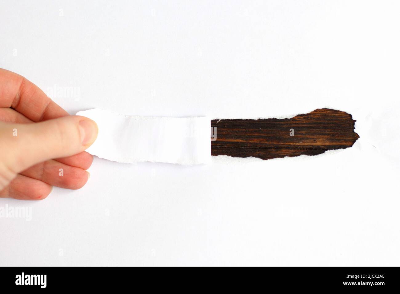 Black woman tear paper hi-res stock photography and images - Alamy