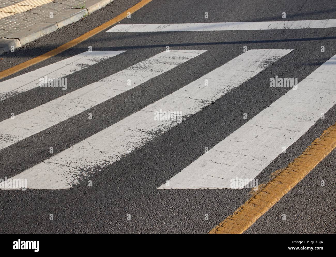 Shadows and graphic shapes in the vehicle road Stock Photo - Alamy
