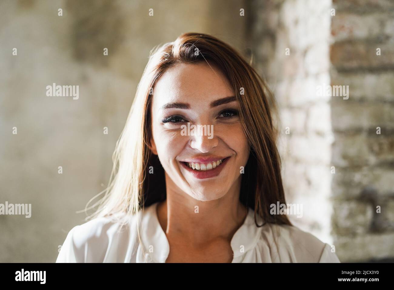 Young business woman working inside modern office - Focus on face Stock ...