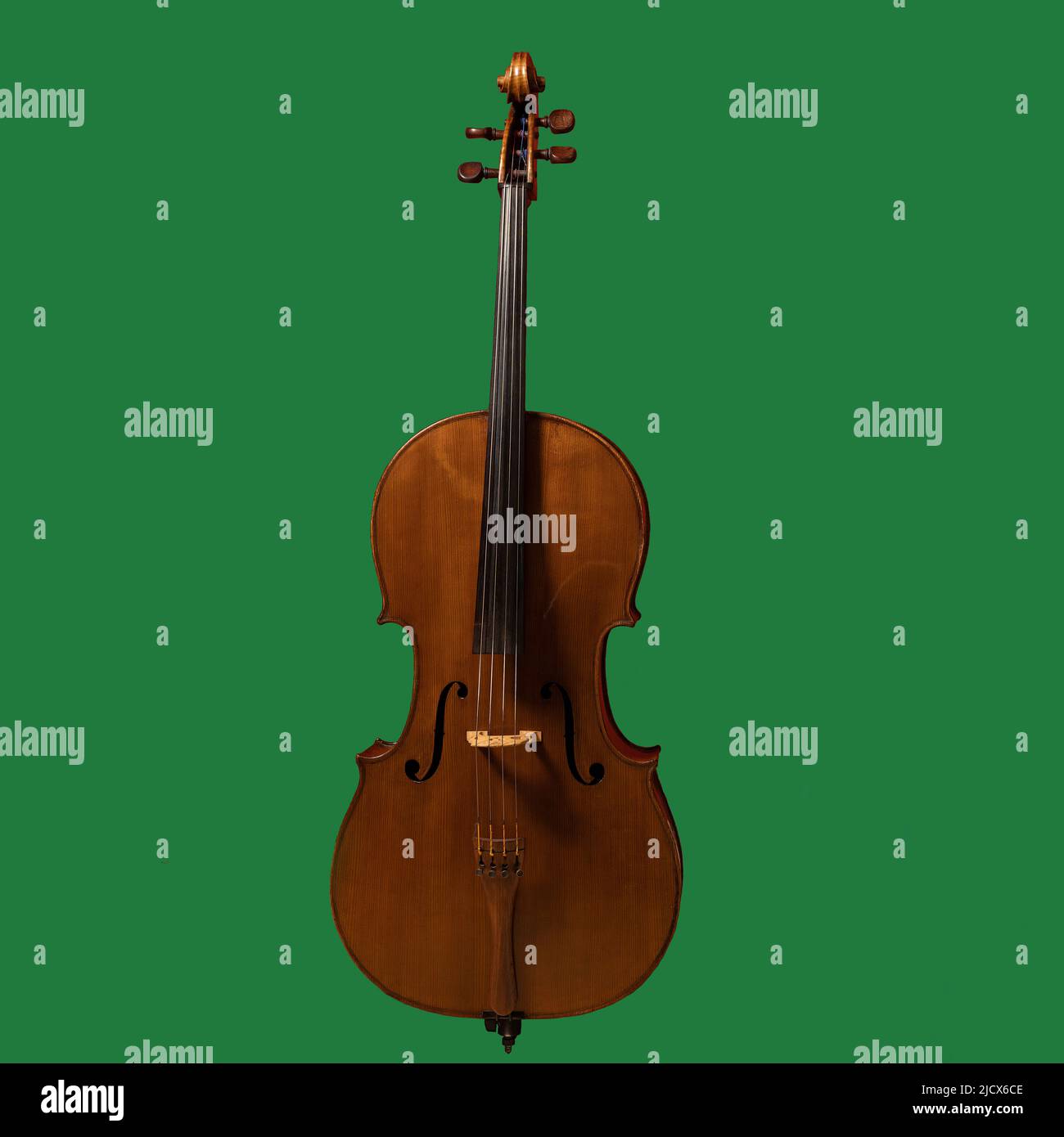 a classical instrument - the cello - isolated on a blue green ...