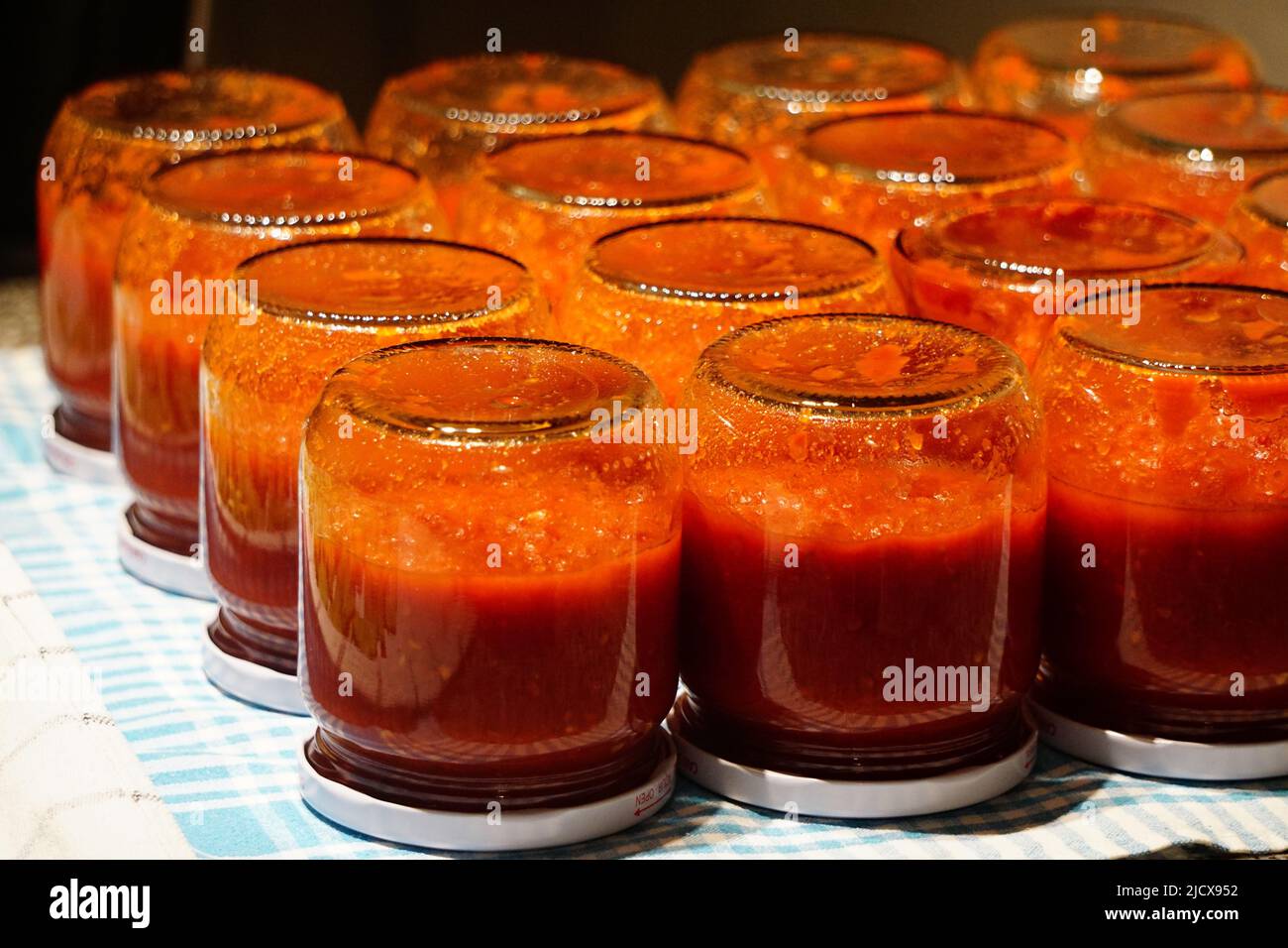 Homemade tomato sauce in the jars traditional prep for the winter ...