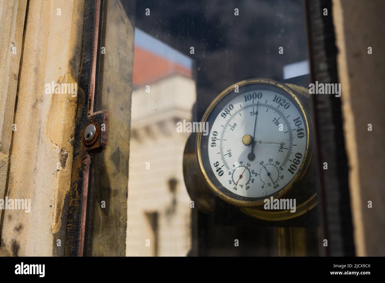 Old barometer on urban street in Wroclaw Stock Photo - Alamy