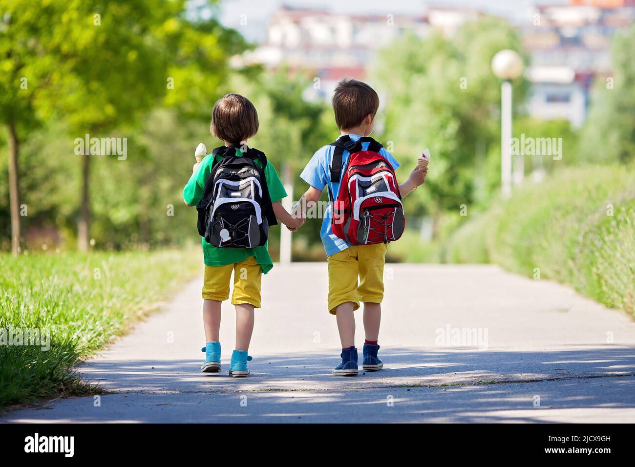 Young Boys Walking Away Together