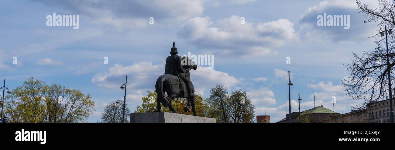 Monument on urban street with sky at background in Wroclaw, banner ...