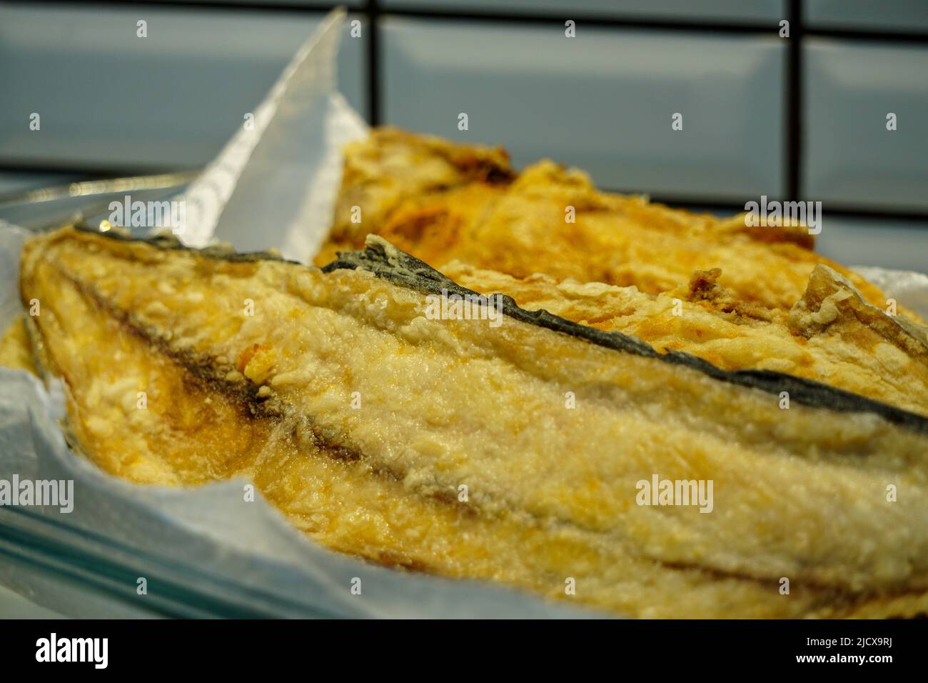 Oil Roasted bonito fish preparation in the kitchen on the oven candid ...