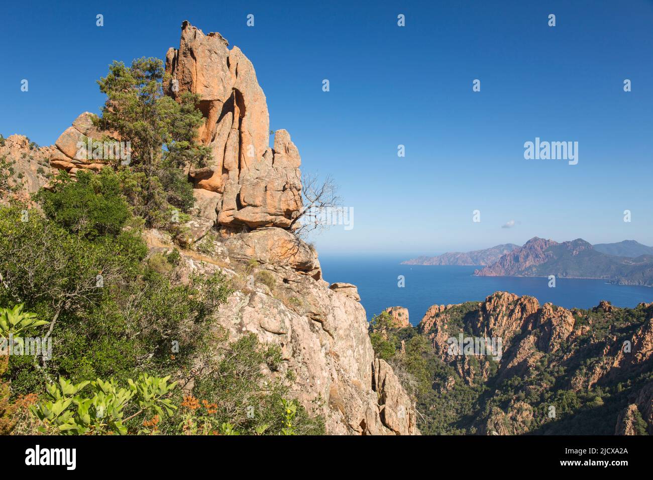 View over the red rocks of the Calanques (Calanche) to the Gulf of ...