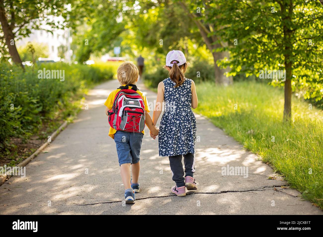 Walking backward child hi-res stock photography and images - Alamy