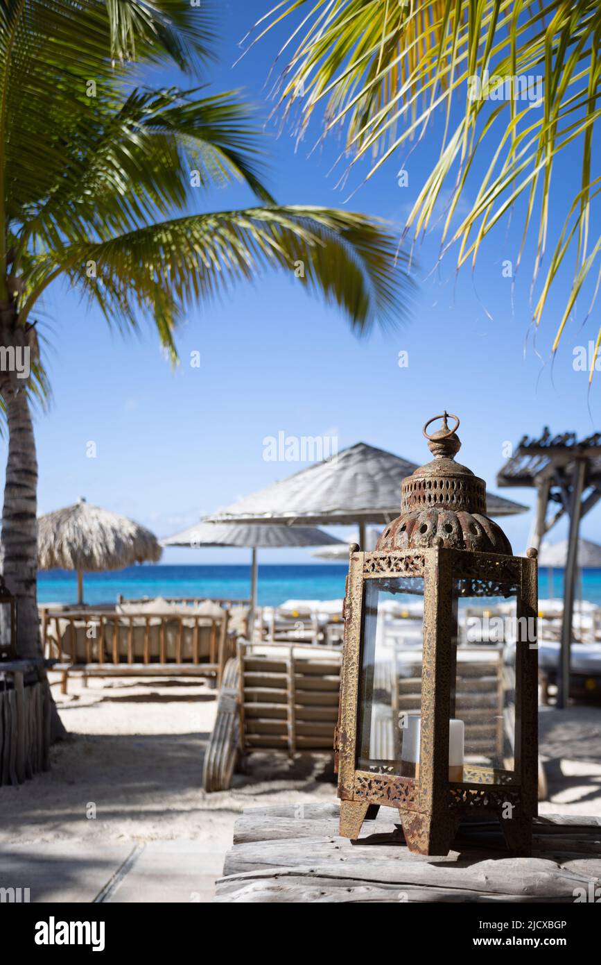 Vintage lantern on a tropical beach club background Stock Photo - Alamy