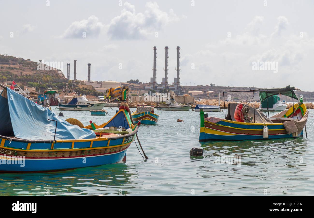 Port of Marsaxlokk with the energy factory Stock Photo - Alamy