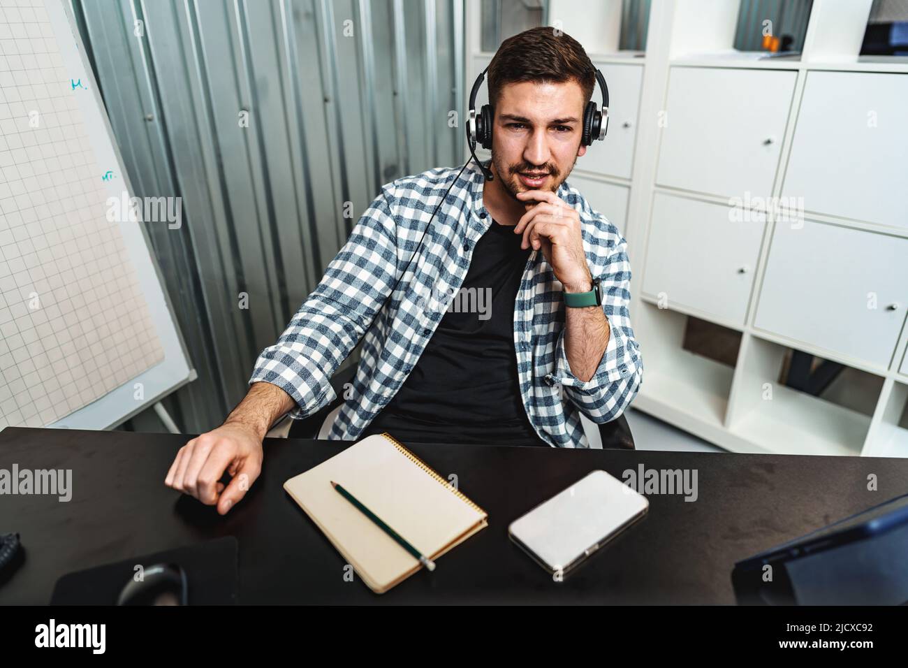 Customer service support operator man with headphones and microphone ...