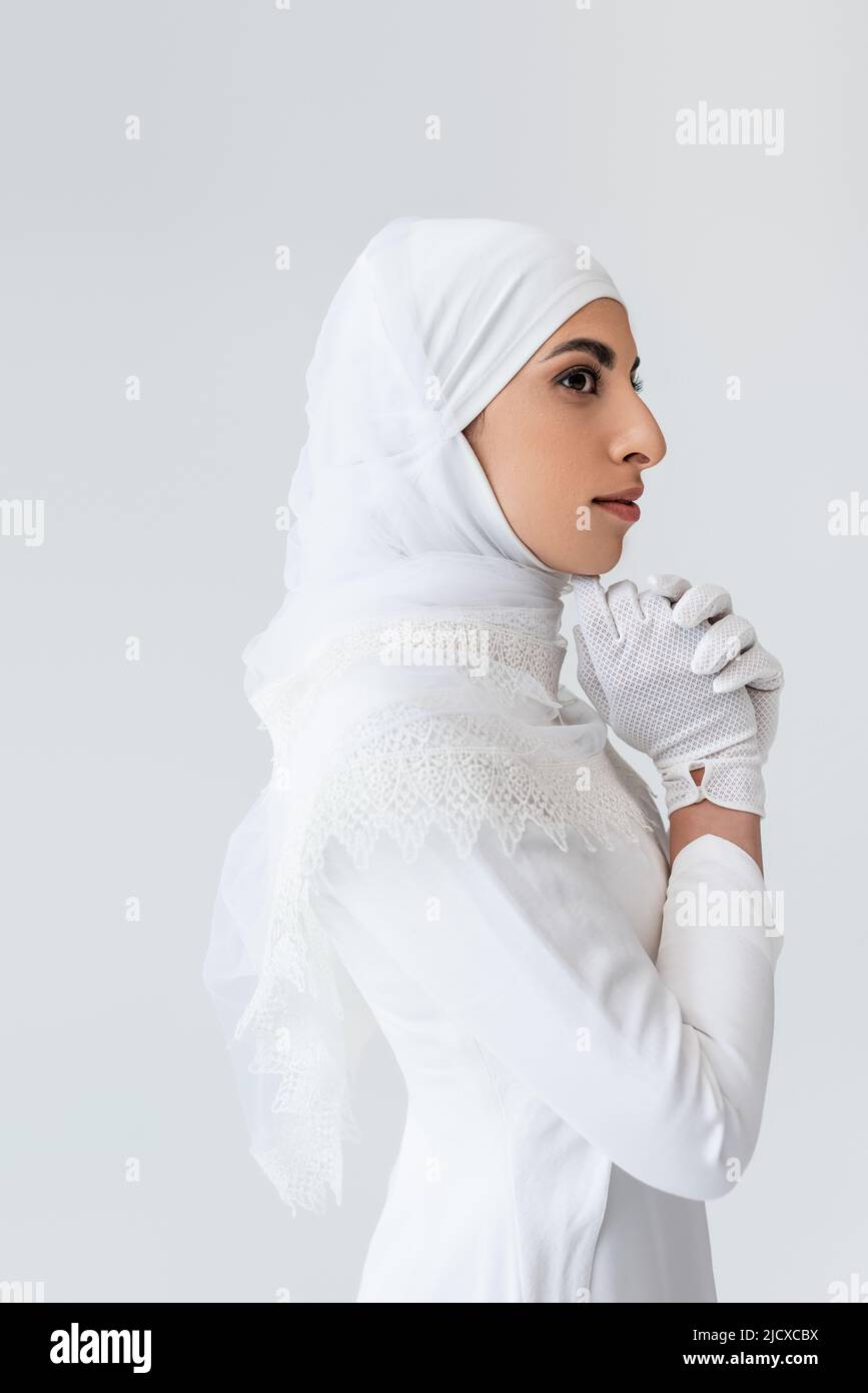 Praying hands and gloves hi-res stock photography and images - Alamy