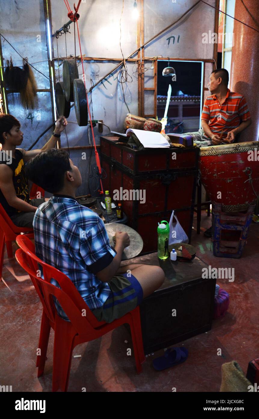 Thai people of chinese descent playing musical instruments sing song ...