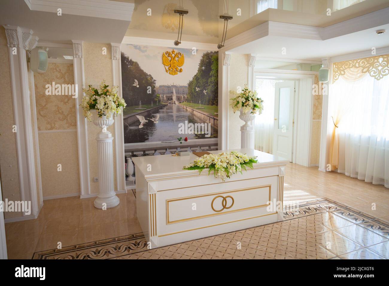 Marriage registry table and flowers lying on it Stock Photo - Alamy