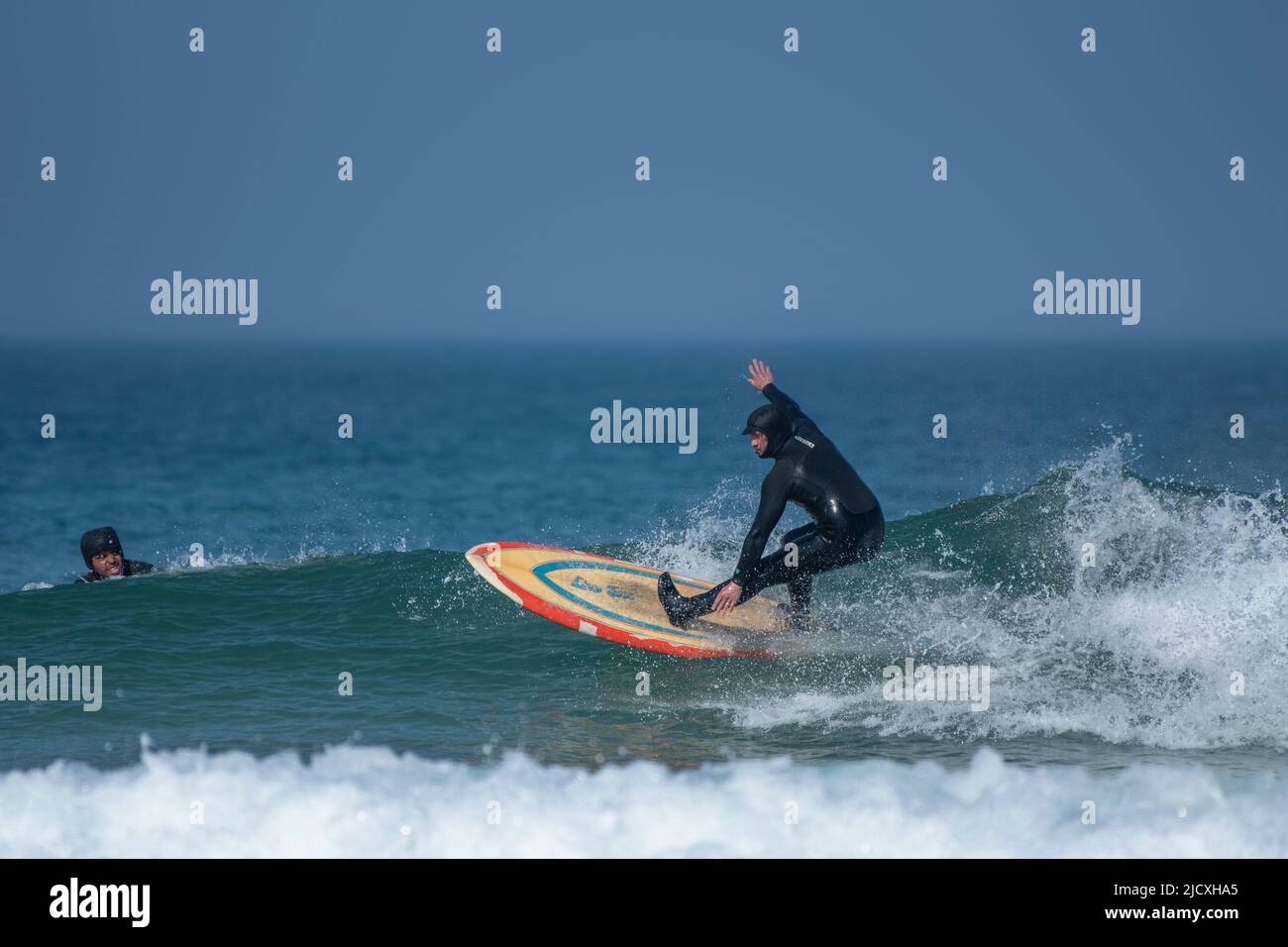 Spectacular surfing action as a surfer rides a wave at Fistral in ...